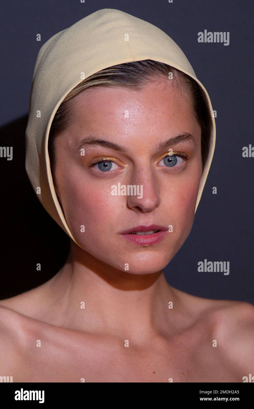 Emma Corrin poses for photographers as she arrives for the Netflix ...