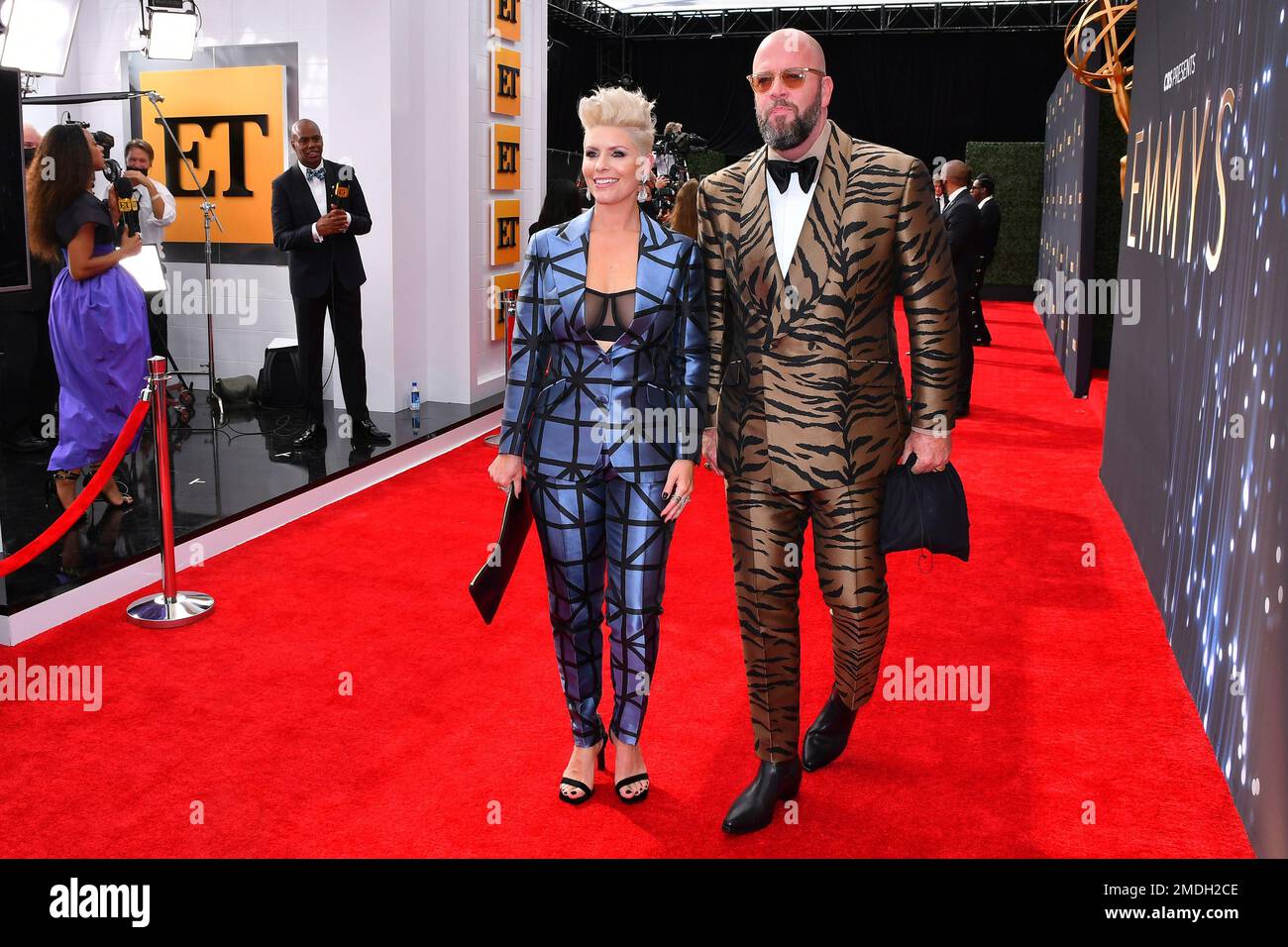 Rachel Sullivan, left, and Chris Sullivan arrive at the 73rd Emmy ...