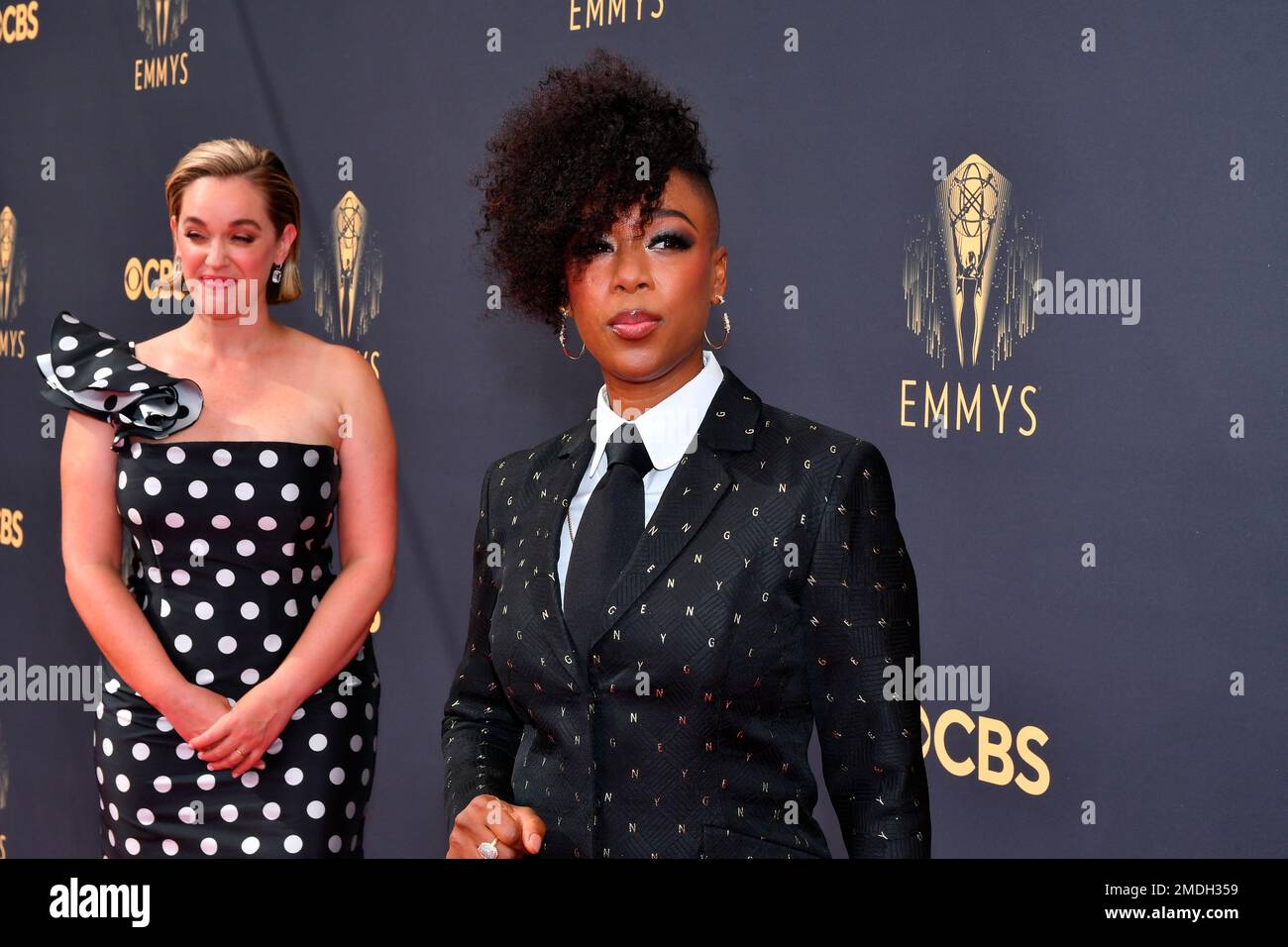 Lauren Morelli, left and Samira Wiley arrive at the 73rd Emmy Awards at the JW Marriott on ...