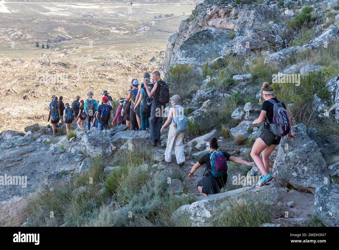 SANDDRIF, SOUTH AFRICA - SEP 7, 2022: Hikers descending Wolfberg below ...
