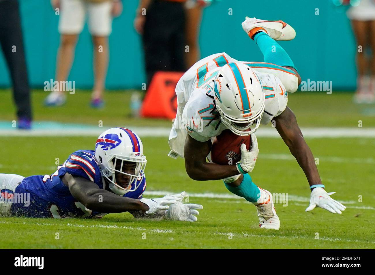 Miami Dolphins wide receiver Jaylen Waddle (17) goes flying as Buffalo ...