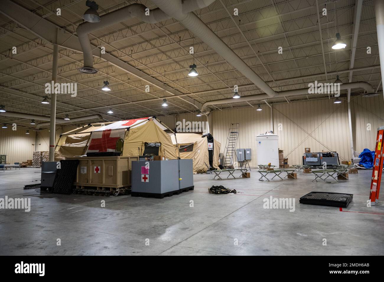 A medical treatment area is set up in a warehouse during exercise Agile ...