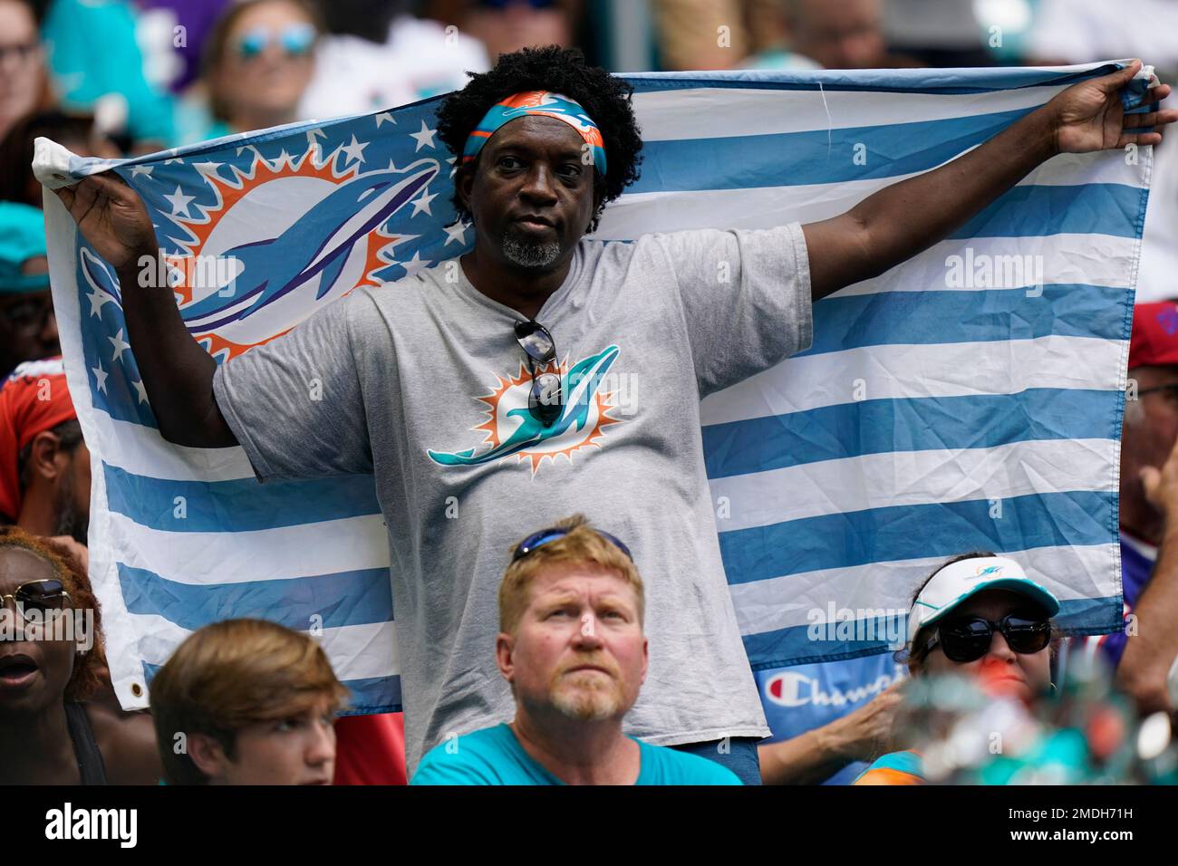 Miami Dolphins fans watch from the stands during the first half of an ...