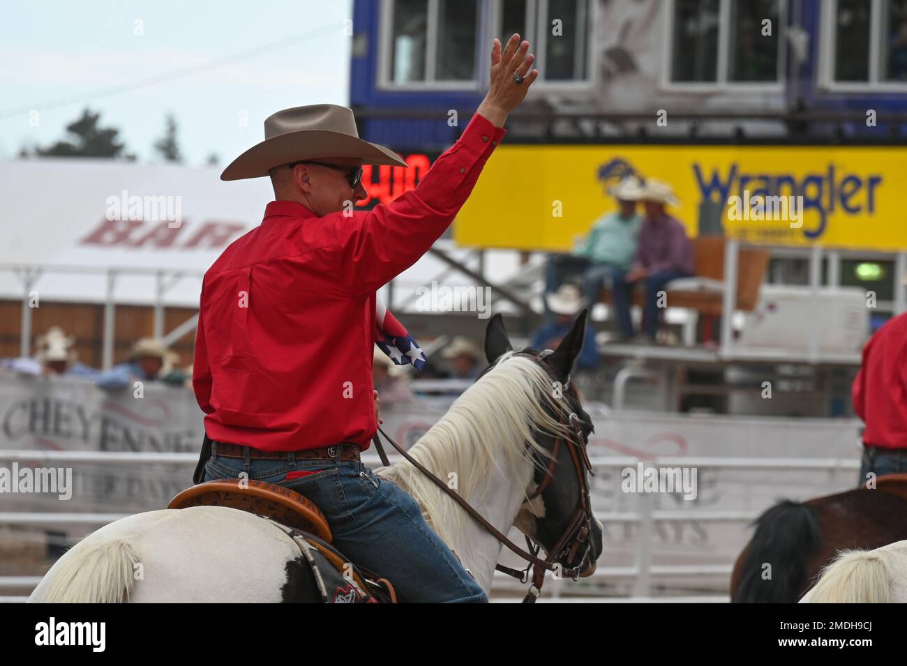 Col. Dean Konowitz, 20th Air Force vice commander, waves to rodeo fans ...