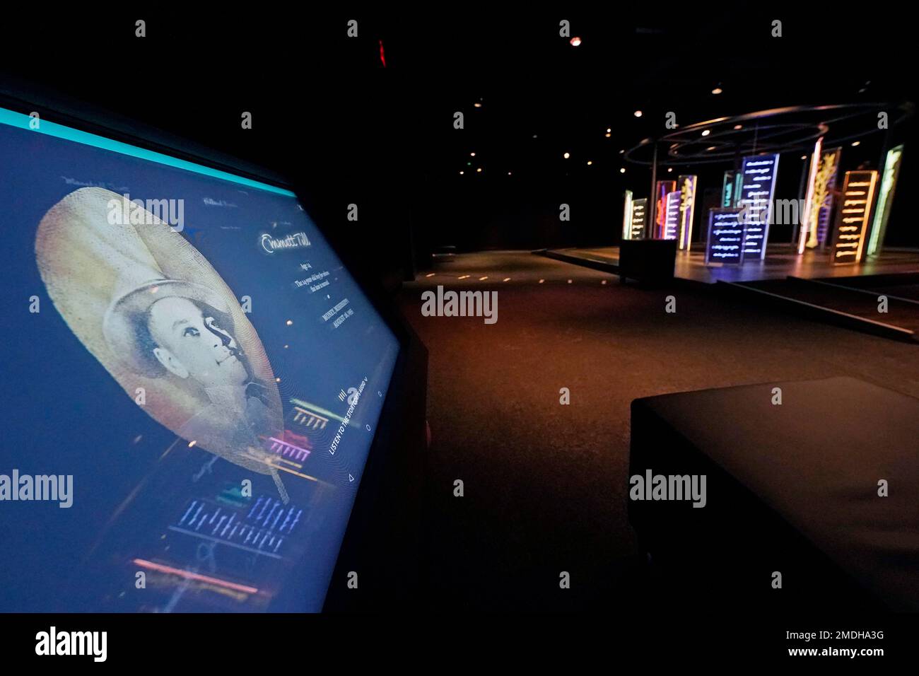 An interactive kiosk, left, sits across from the PBS Frontline's ...