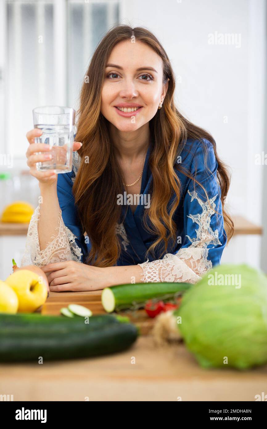 Woman drink water home hi-res stock photography and images - Alamy