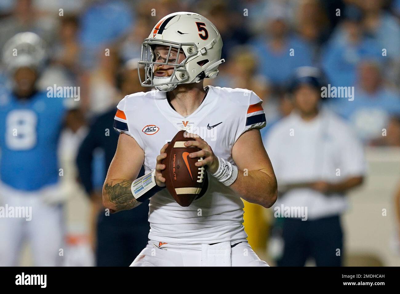 Virginia quarterback Brennan Armstrong (5) looks to pass against North ...