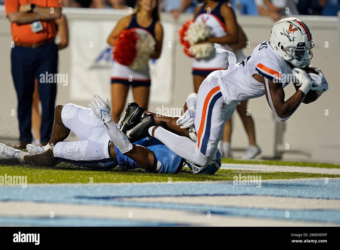 Virginia wide receiver Dontayvion Wicks (3) scores a touchdown as North ...