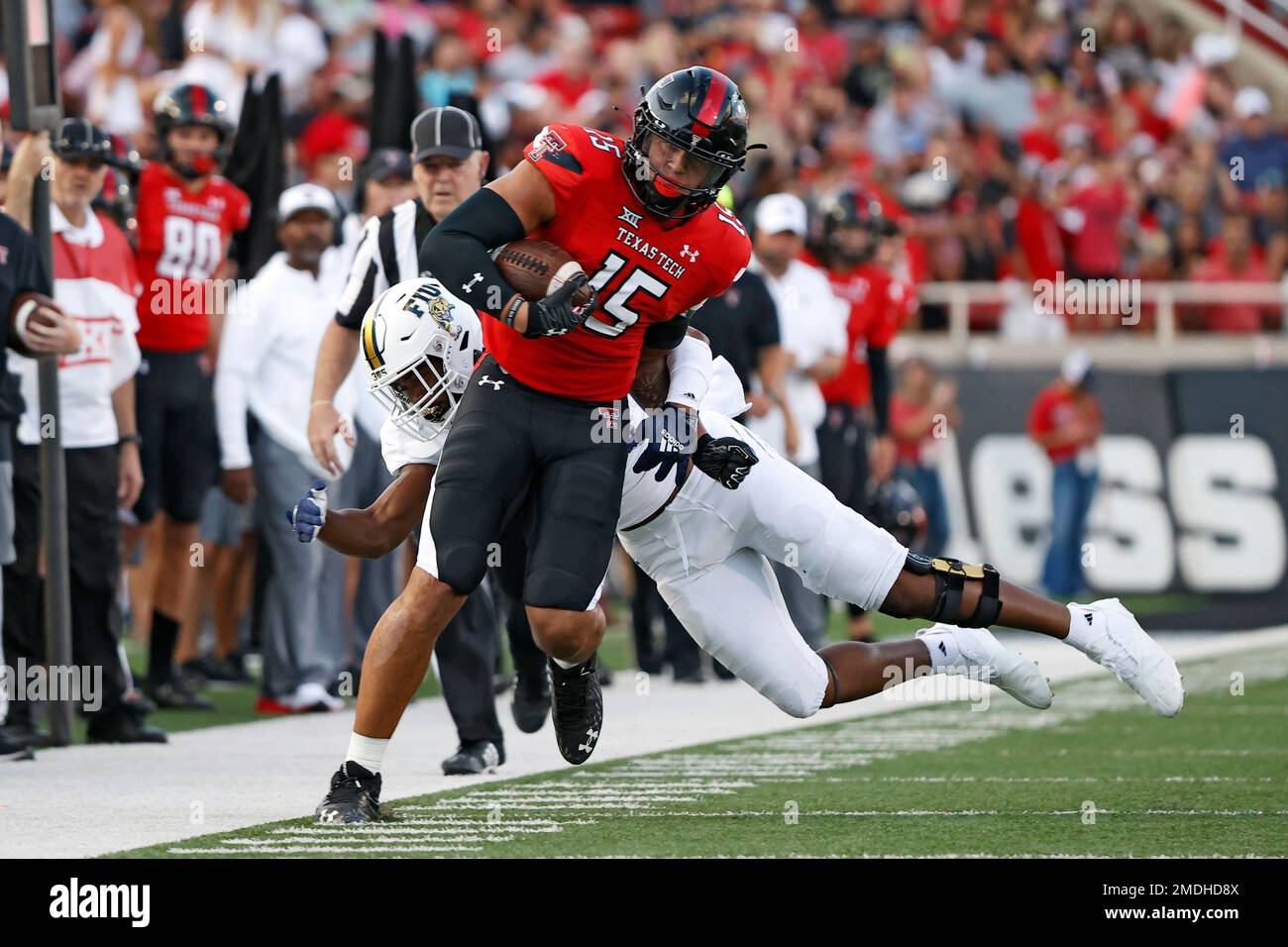 Florida International's Jamal Gates (9) tackles Texas Tech's Travis ...