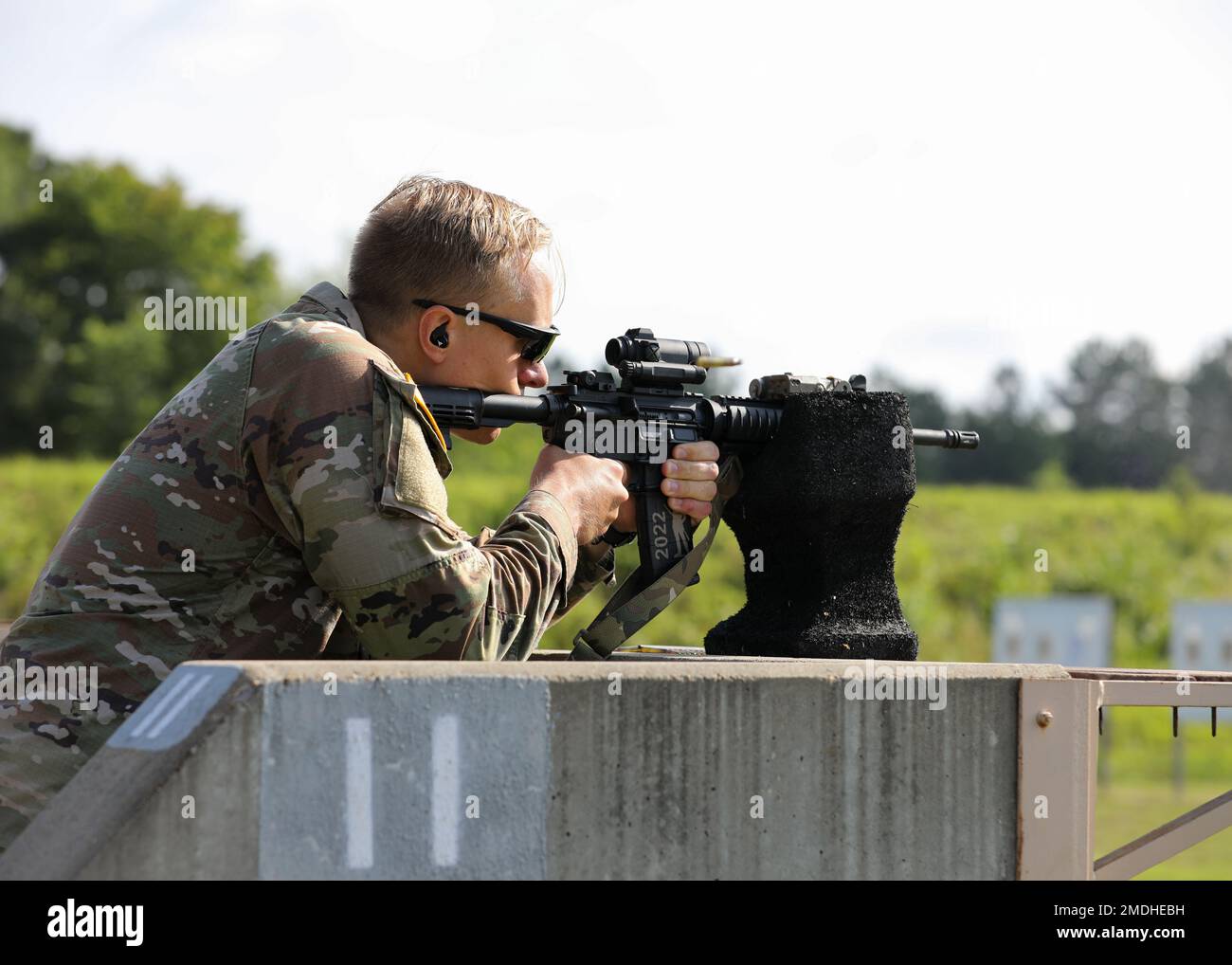 U.S. Army Spc. Daniel Reading of the Maryland National Guard fires his ...
