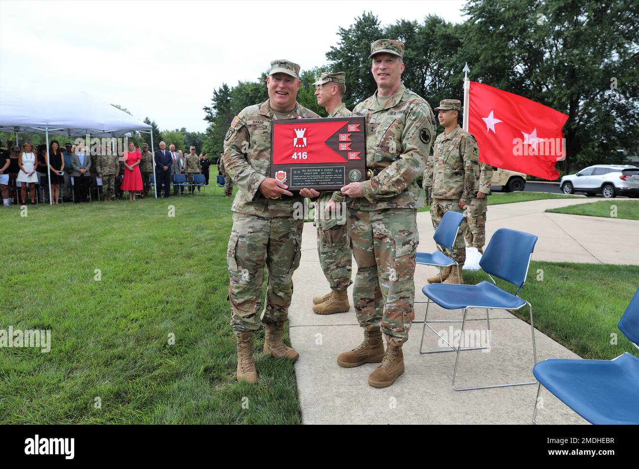 Outgoing Commanding General, Maj. Gen. Matthew V. Baker receives a gift ...