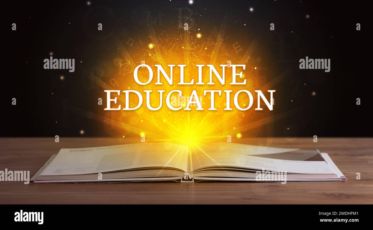 Educational inscription coming out from an open book Stock Photo - Alamy