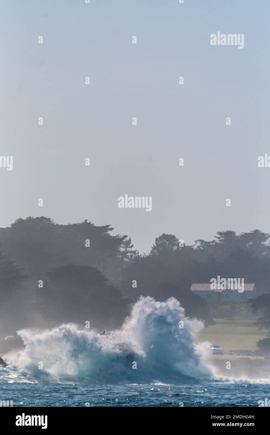 A giant wave is breaking at a cliff in Monterey Bay, California Stock ...