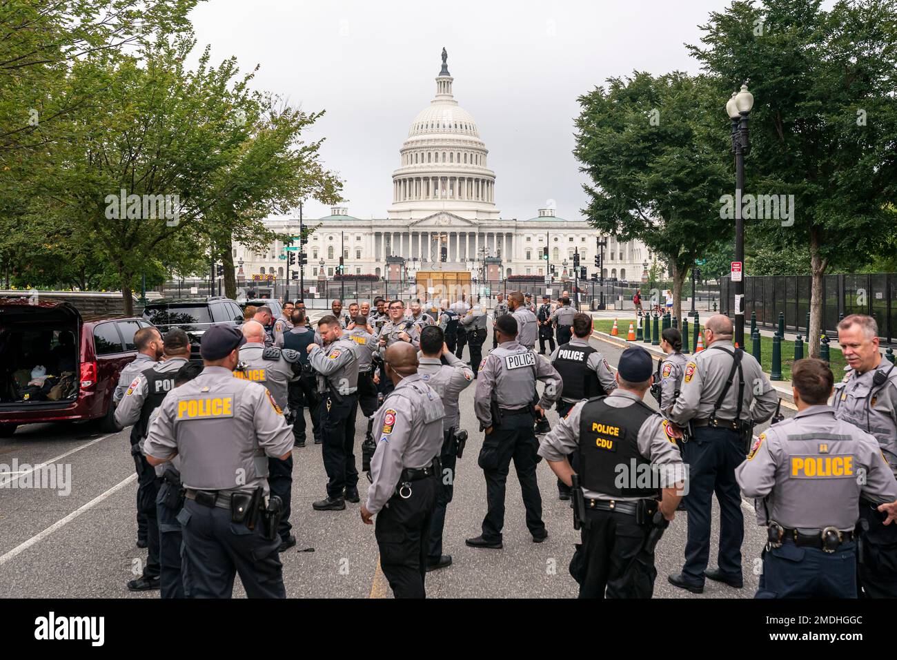 Police stage at a security fence ahead of a rally near the U.S. Capitol ...