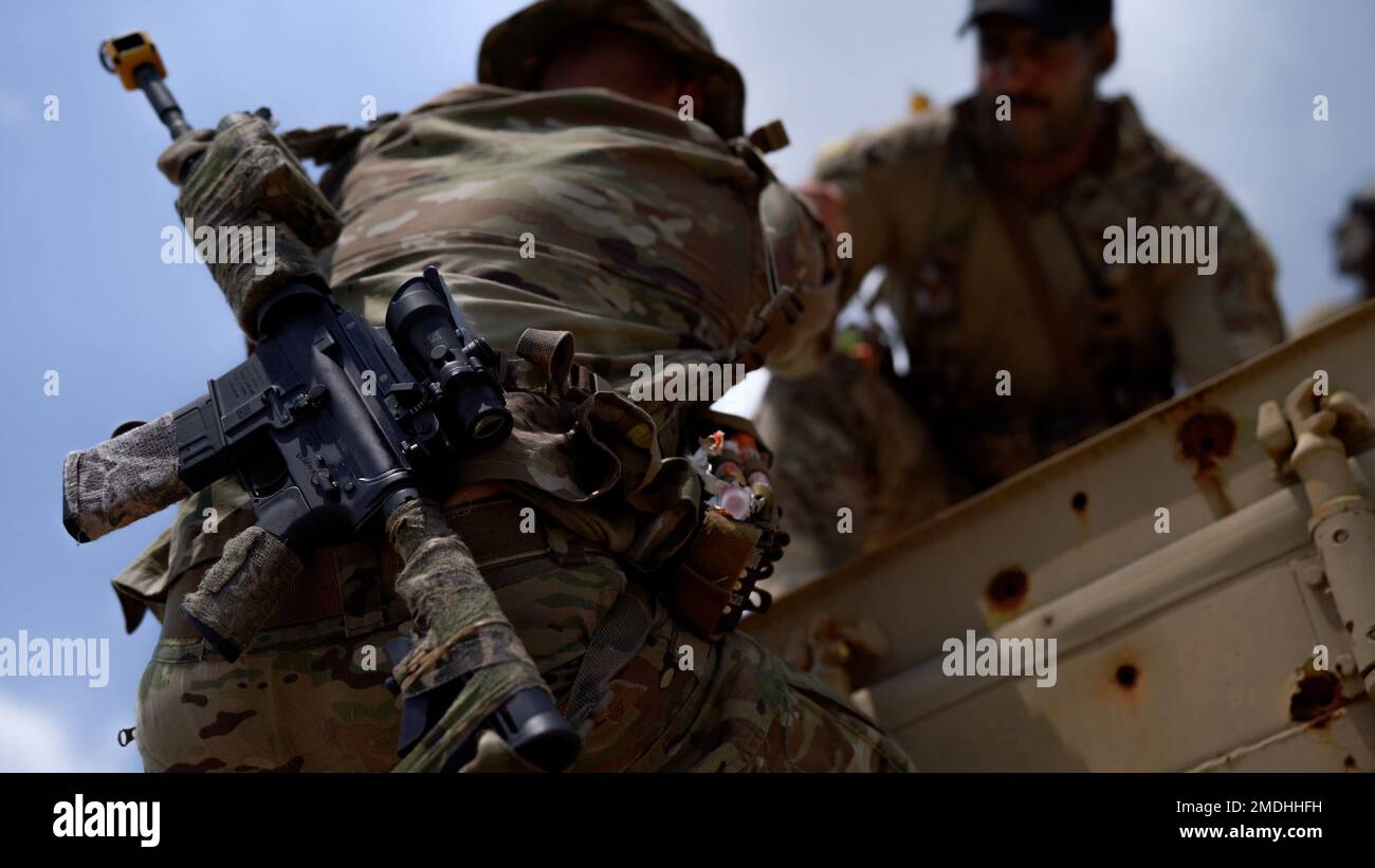 U.S. Air Force 2nd Lt. Ben Daniels, right, pulls up Senior Airman Chase ...