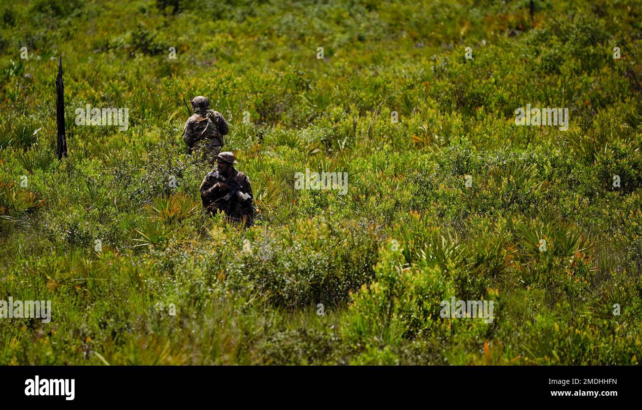 U.S. Air Force Senior Airman Angel Peydon, back, and 2nd Lt. Ben ...