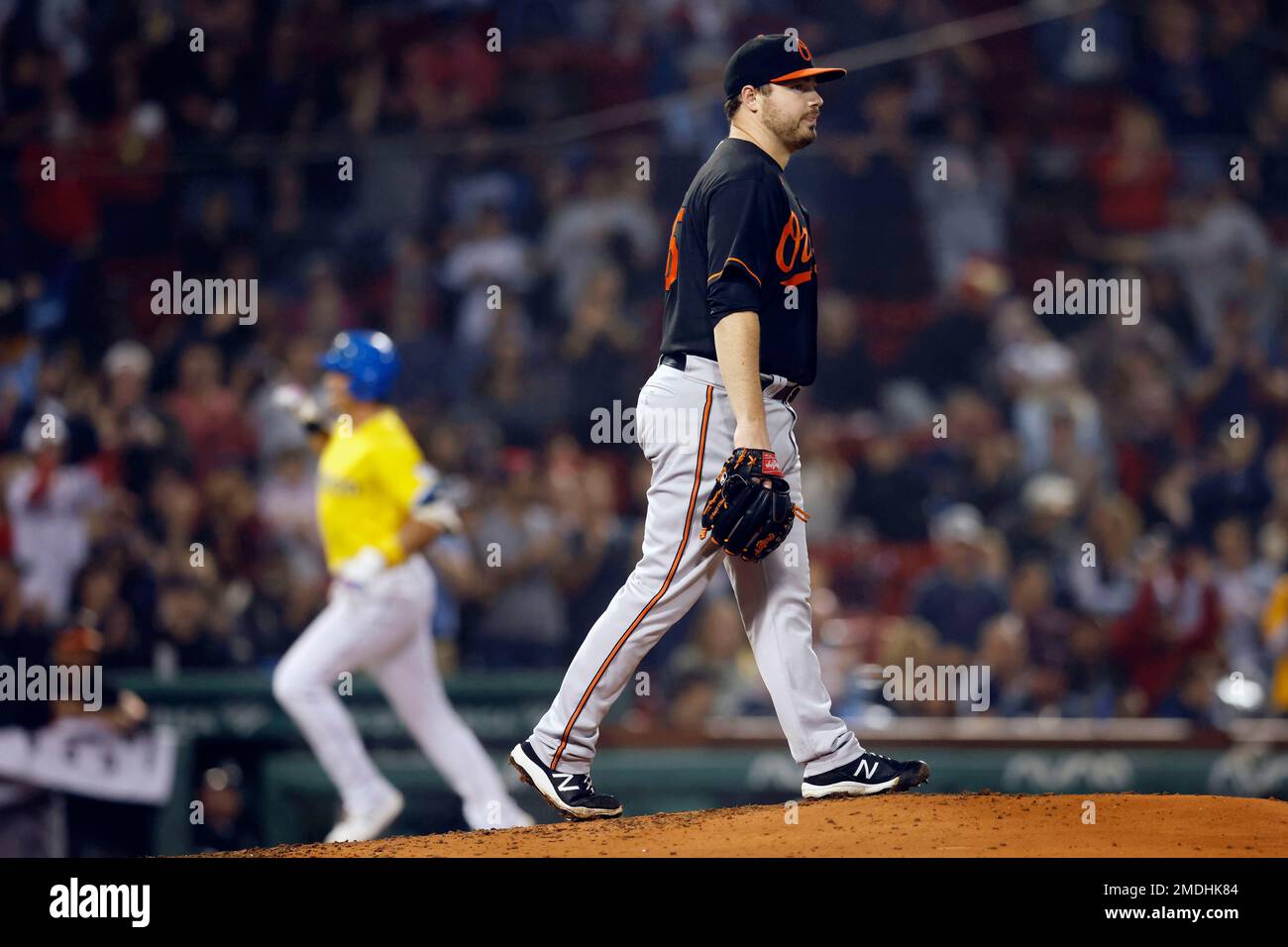 Baltimore Orioles' Keegan Akin walks on the mound after giving up a ...