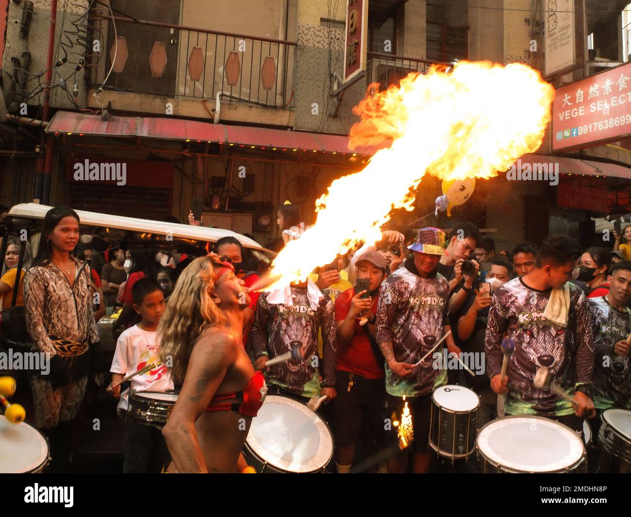 Manila, Philippines. 22nd Jan, 2023. A gay performer blows fire to ...