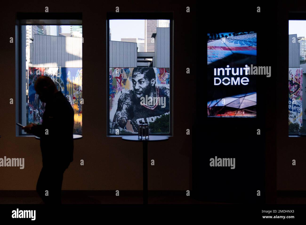 A mural depicting Los Angeles Clippers' Kawhi Leonard is seen through a ...