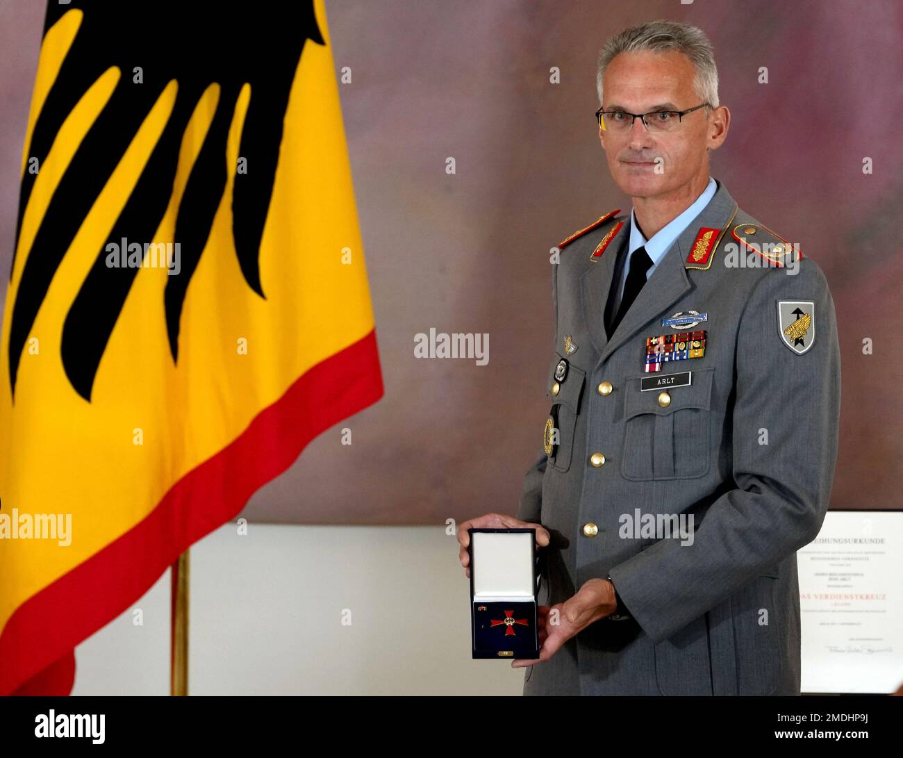 The honored brigadier-general of the German Forces Jens Arlt poses for ...