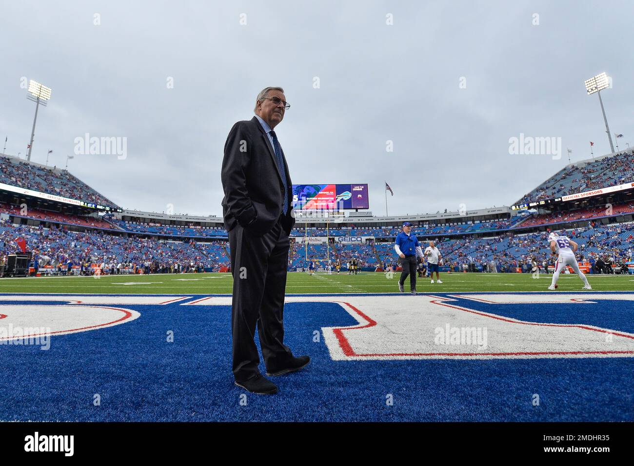 Buffalo Bills owner/CEO Terry Pegula stands on the field during warmups ...