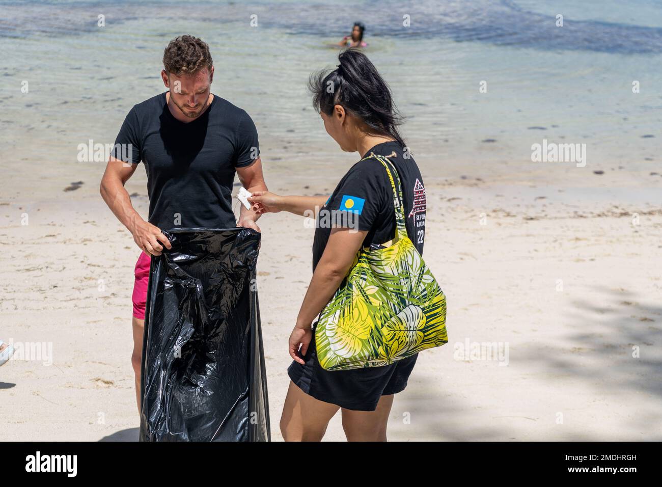 U.S. Marine Corps Sgt. Rory Brady, left, an explosive ordnance ...