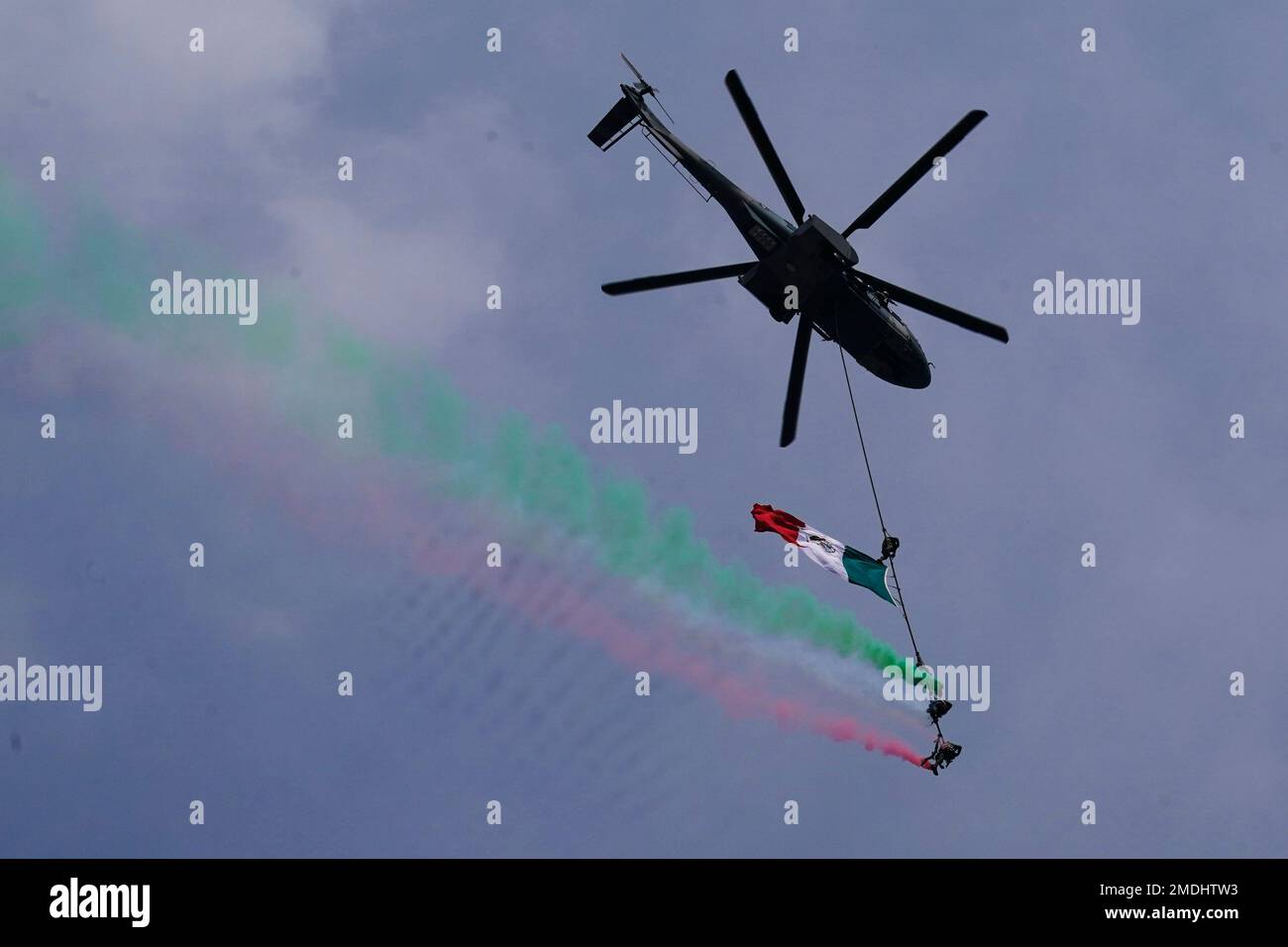 Special forces billowing smoke in the colors of the Mexican flag, hang ...