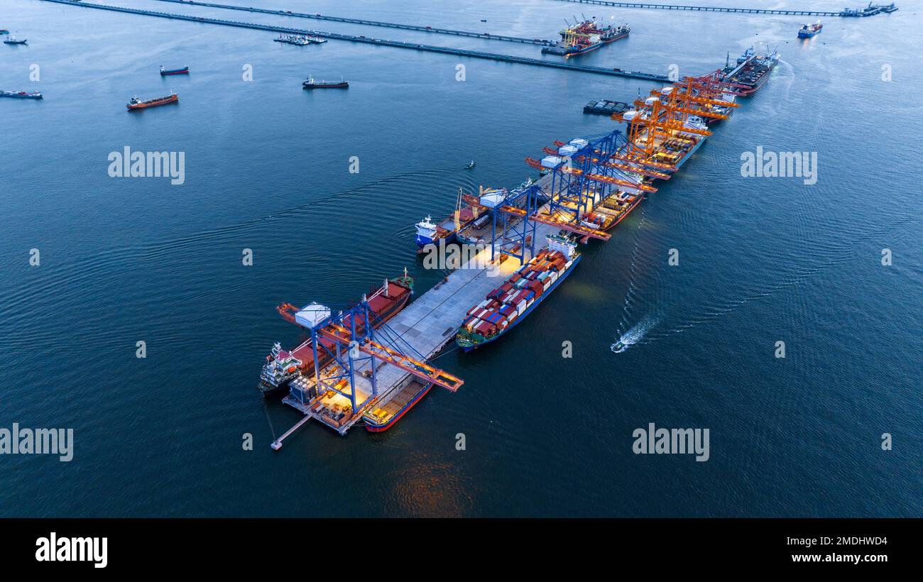 Cargo container Ship load container box to Cargo Ship at Shipyard ...