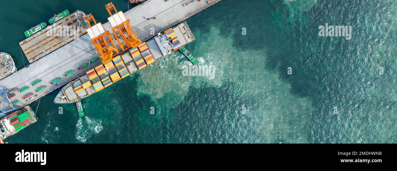 Crane loading cargo box to Large container Ship at Cargo Sea Port ...