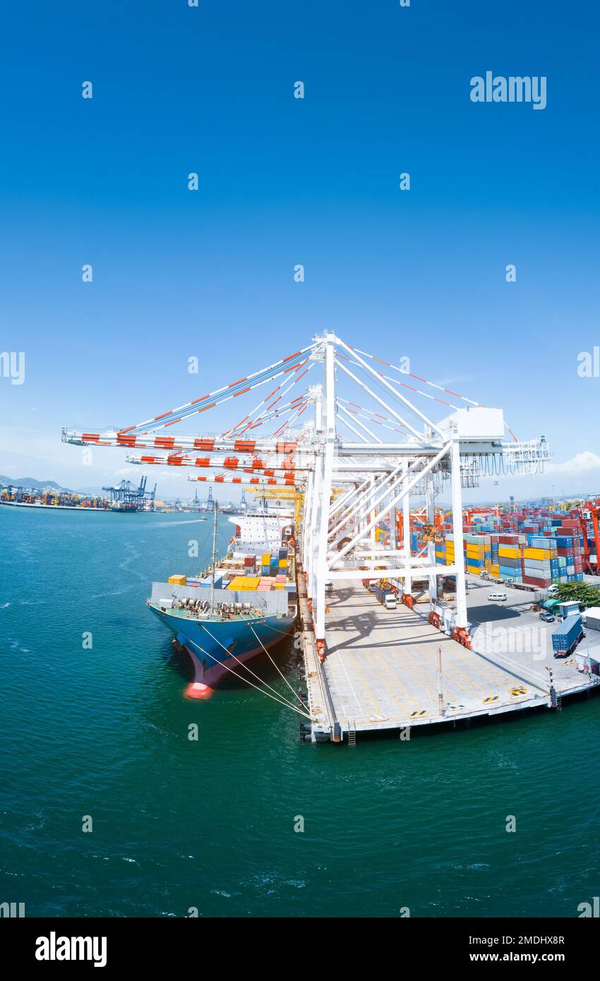 Crane loading cargo box to Large container Ship at Cargo Sea Port ...