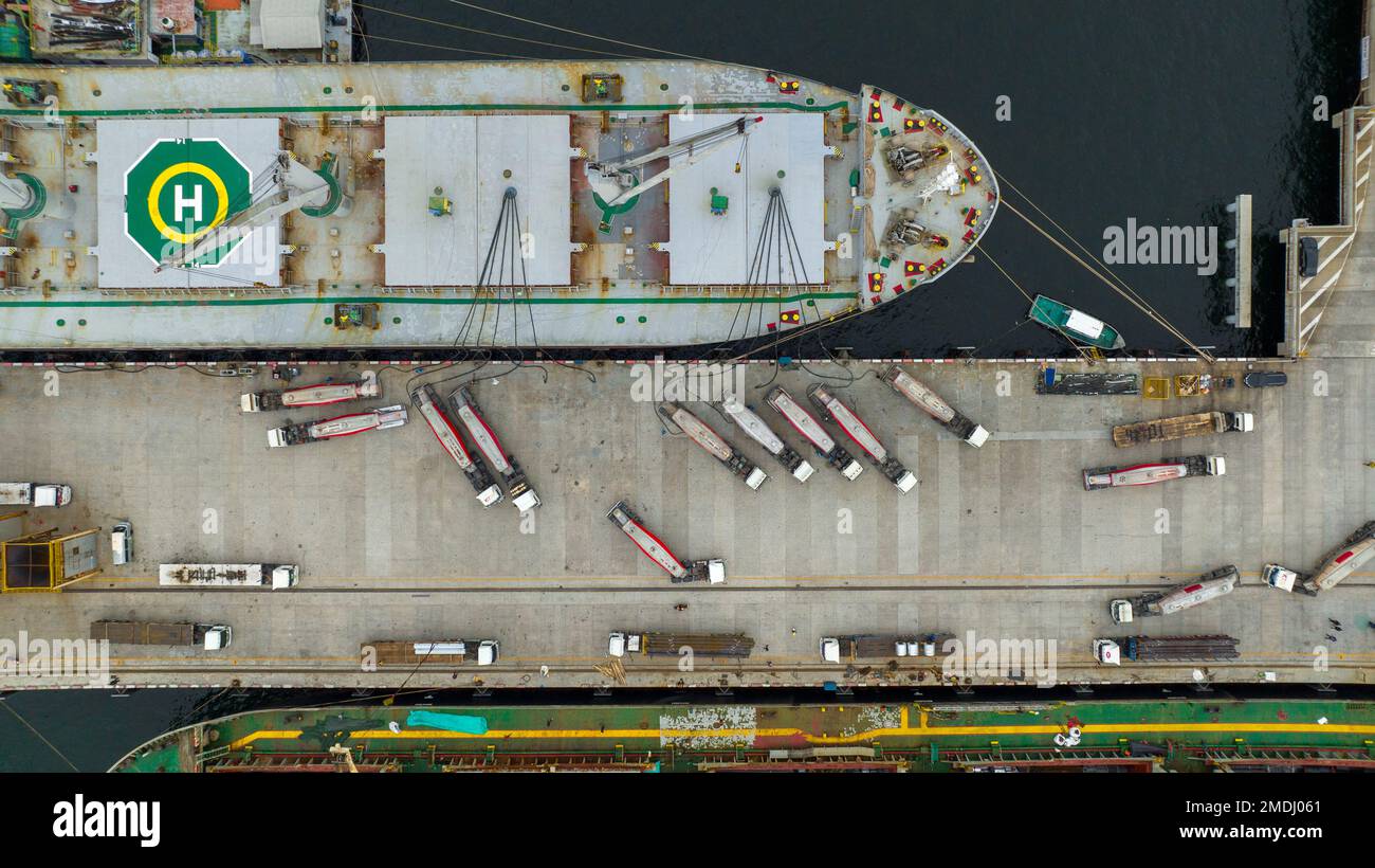 Powder tanker trailer Truck going to load cemant powder to large ship ...