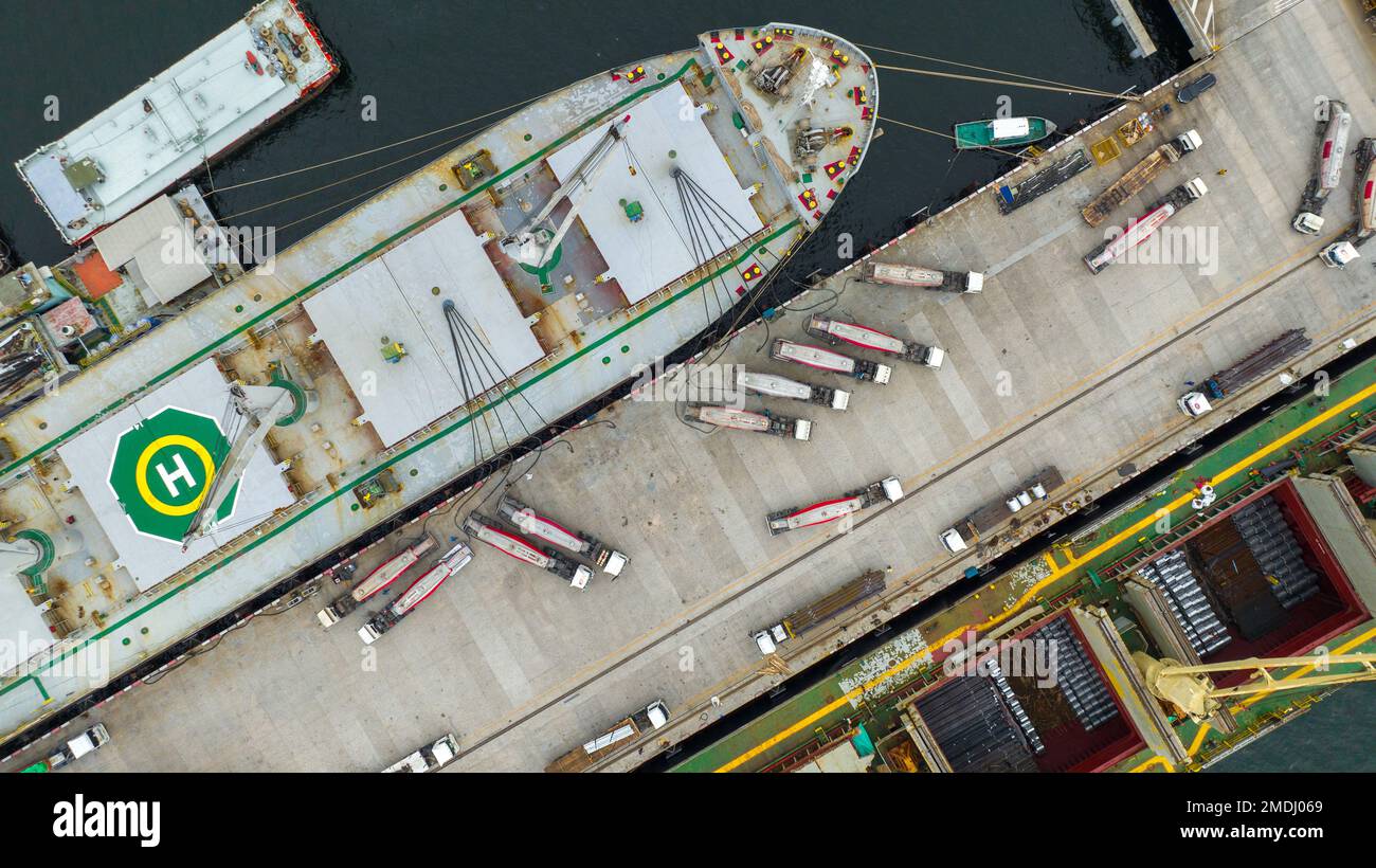 Powder tanker trailer Truck going to load cemant powder to large ship ...