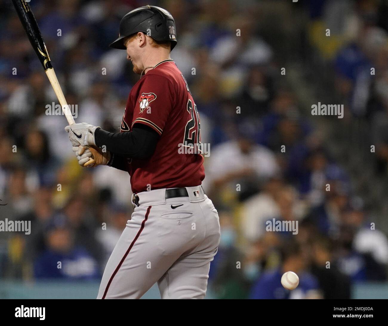 Arizona Diamondbacks' Pavin Smith is hit by a pitch from Los Angeles ...