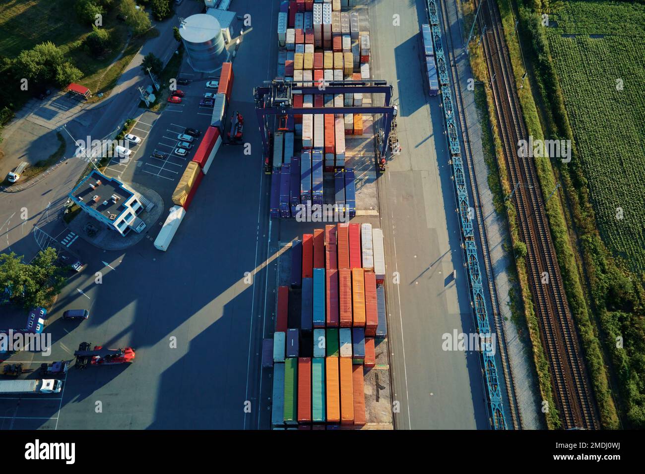 Shipping container site in warehouse storage factory, aerial view ...