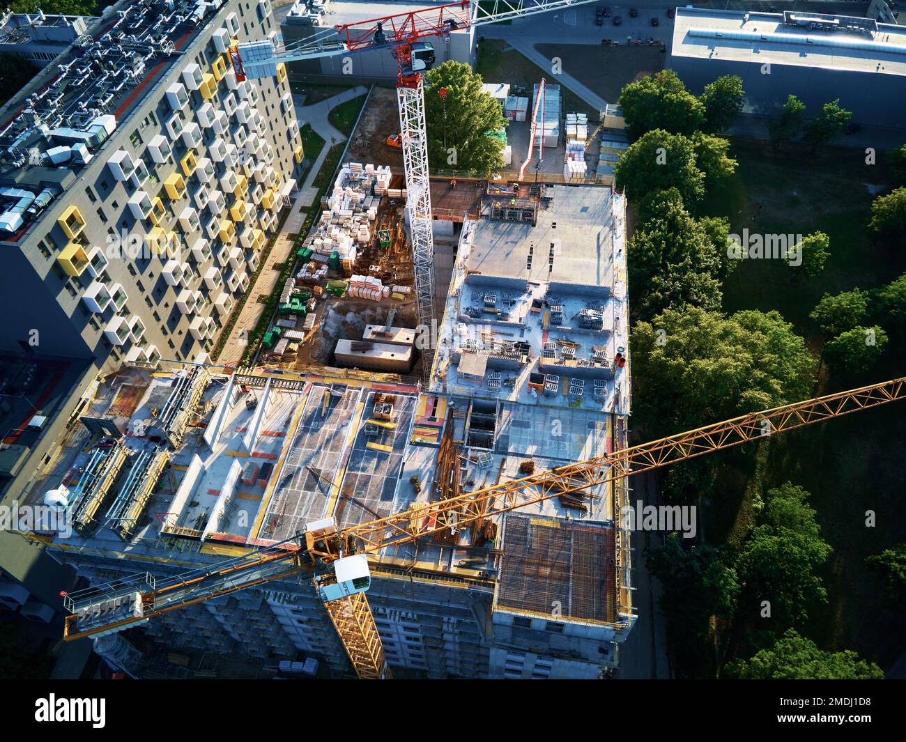 Aerial view of construction site with residential building under ...