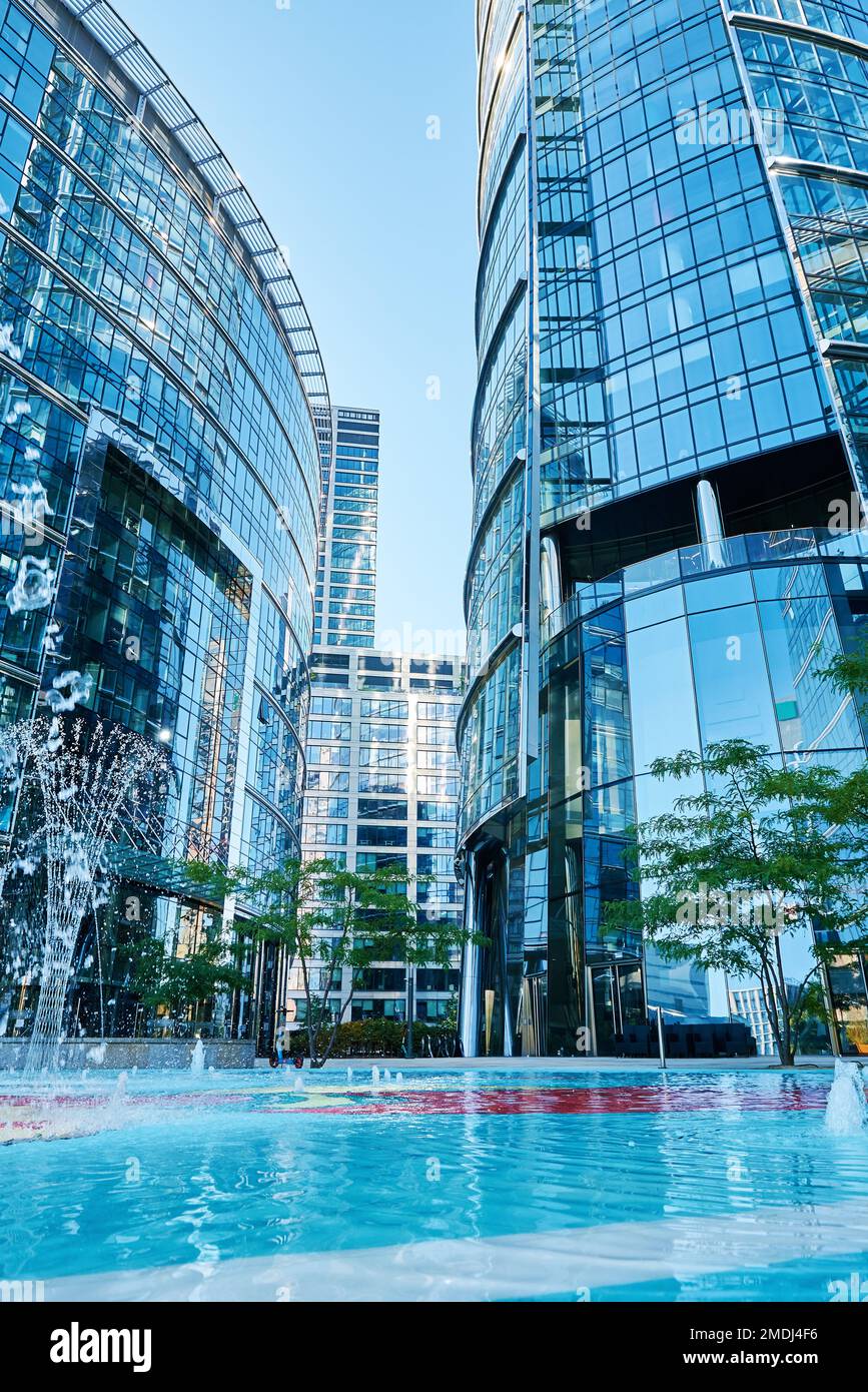 Detail of skyscraper office buildings with glass facades. Modern urban ...