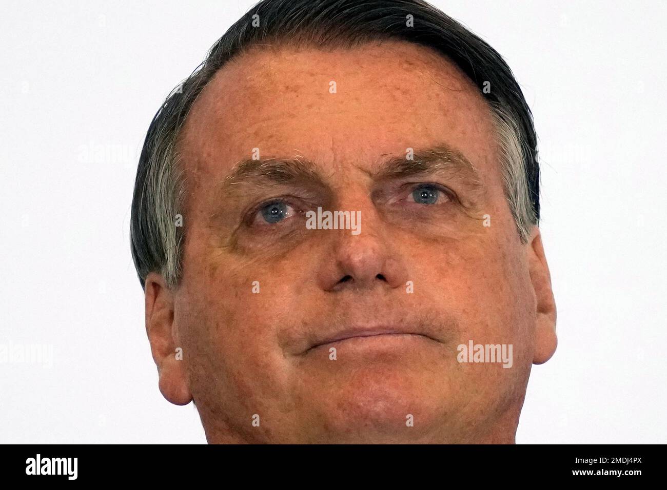 Brazilian President Jair Bolsonaro attends a housing program launch ...