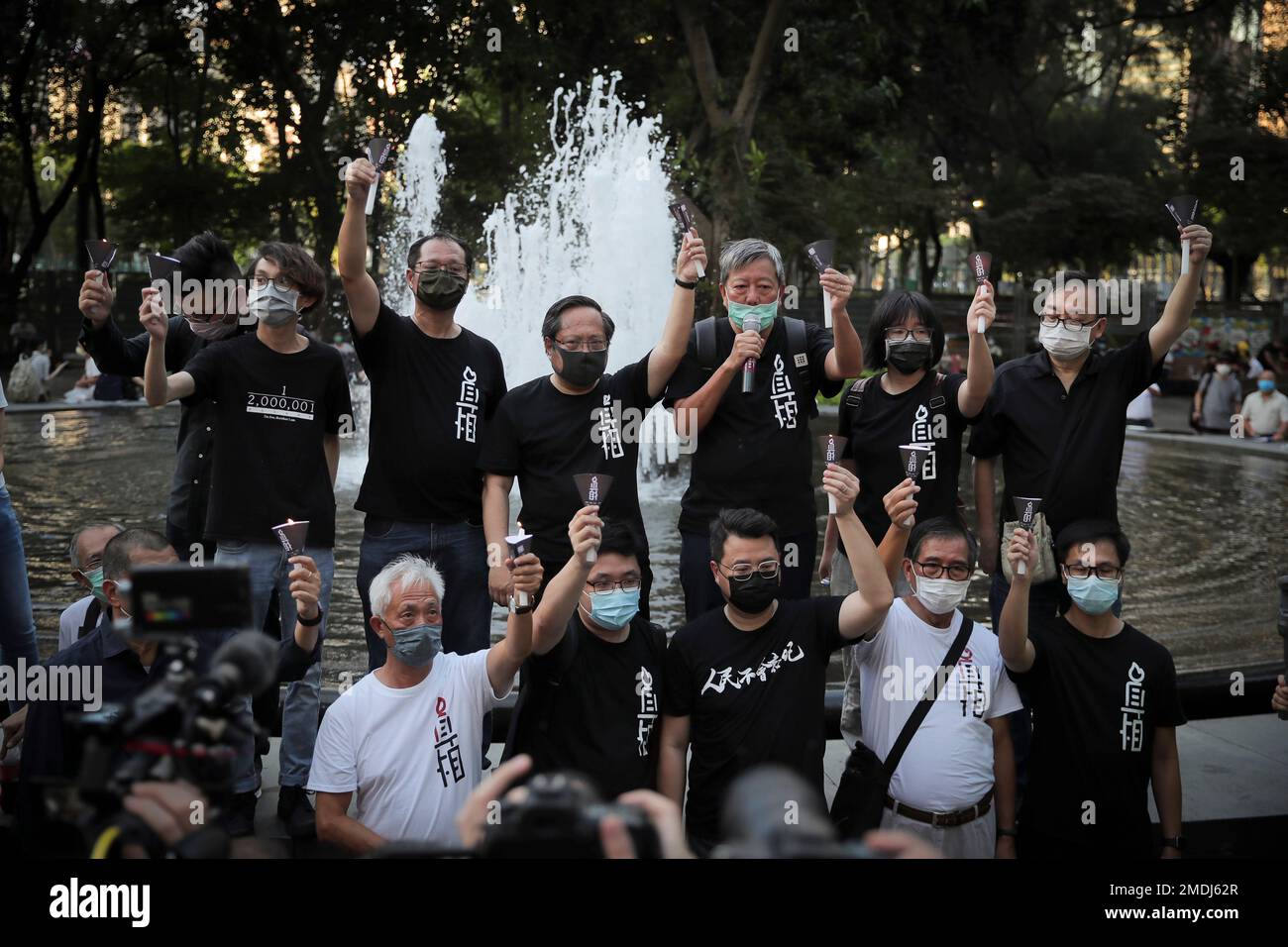 FILE - In this June 4, 2020, file photo, pro-democracy activists shout ...