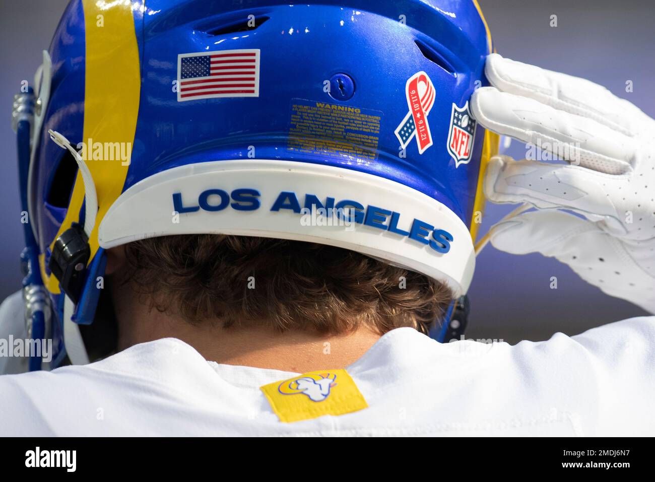 Los Angeles Rams running back Jake Funk (34) fixes his helmet before an ...