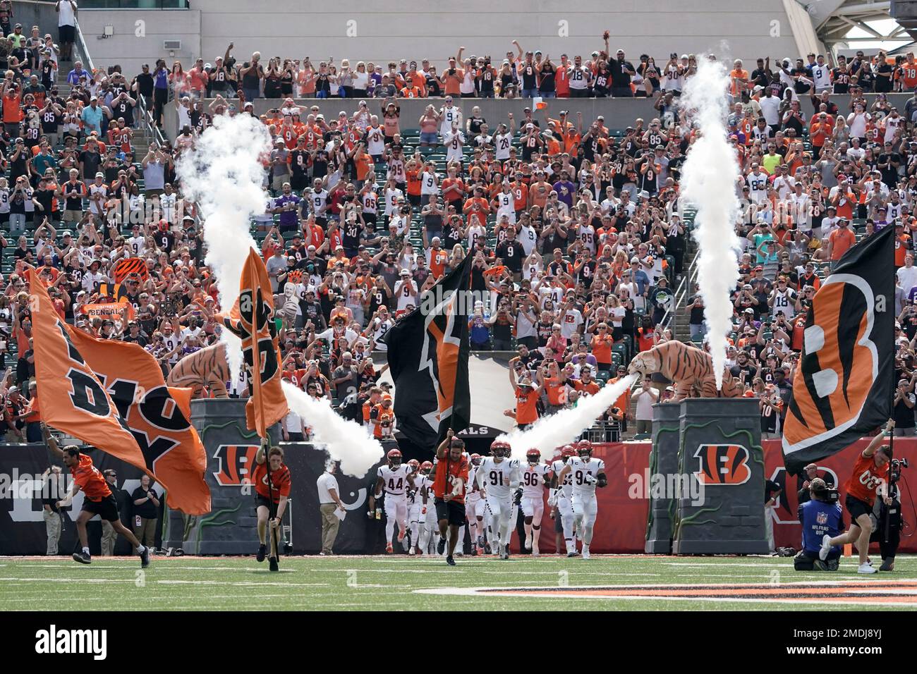 Cincinnati Bengals players run onto the field prior to an NFL football ...
