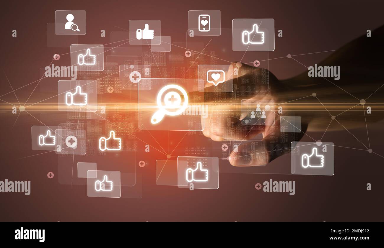 Hand pressing social media multimedia application screen with media ...