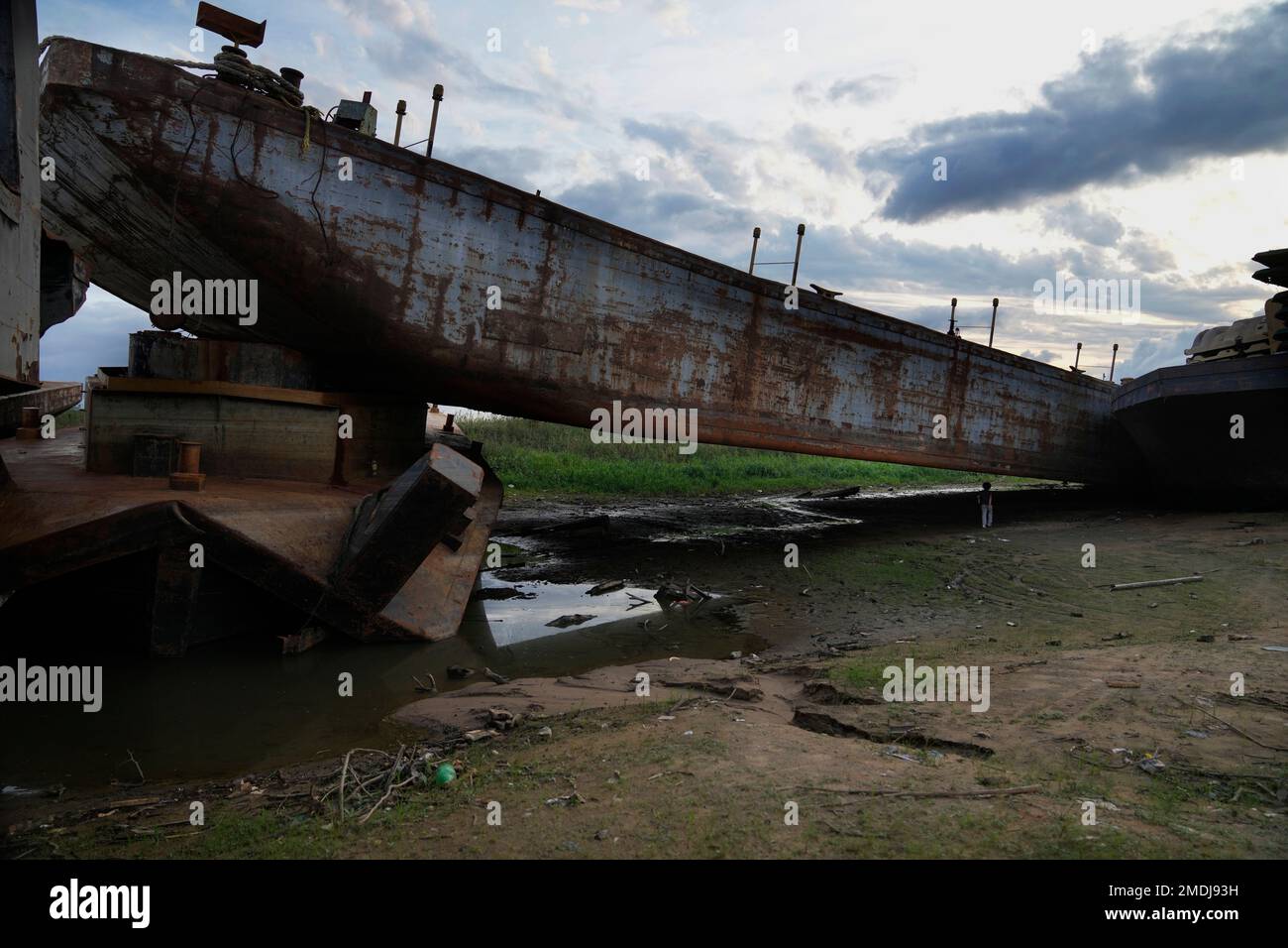 Barges lay stranded next to one of the branches of the Paraguay river ...