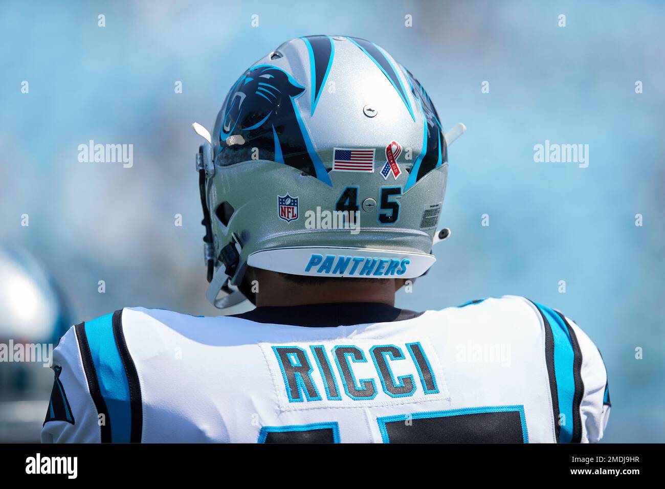 A sticker commemorating the 20th anniversary of 9/11 adorns the helmet ...