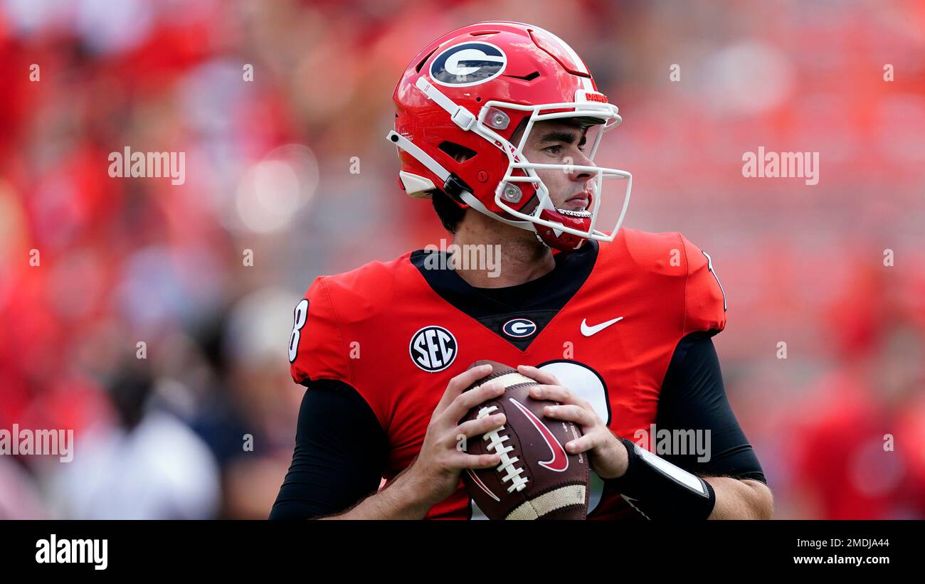 Georgia quarterback JT Daniels (18) warms up before an NCAA college ...