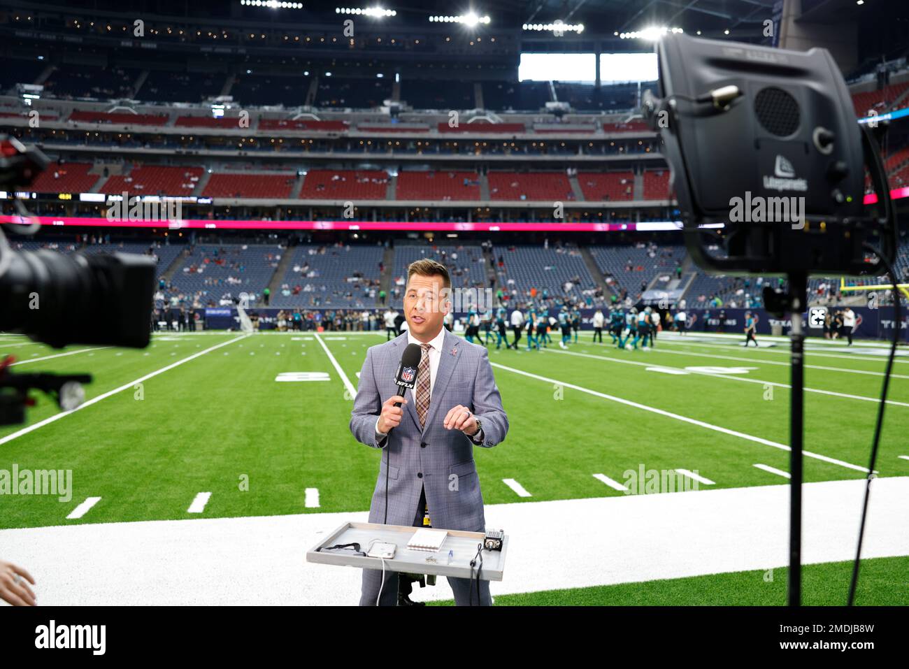 NFL Network reporter James Palmer gives a report during pregame warmups ...