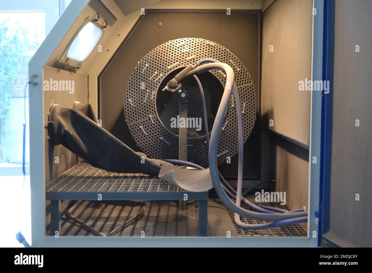 Inside Shot blasting machine. Open machine for Shot blasting of objects ...