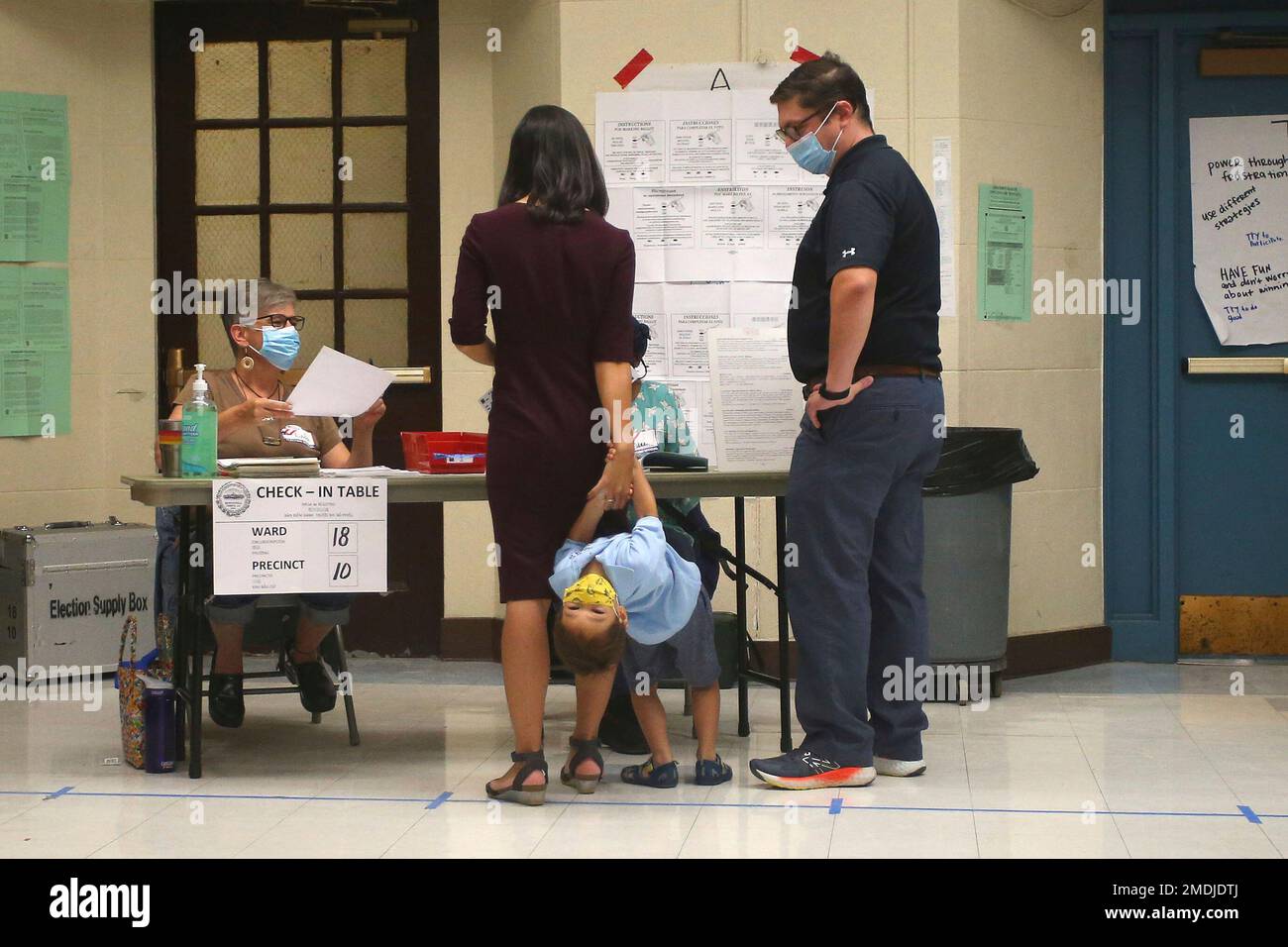 Boston mayoral candidate Michelle Wu , second left, and her husband ...