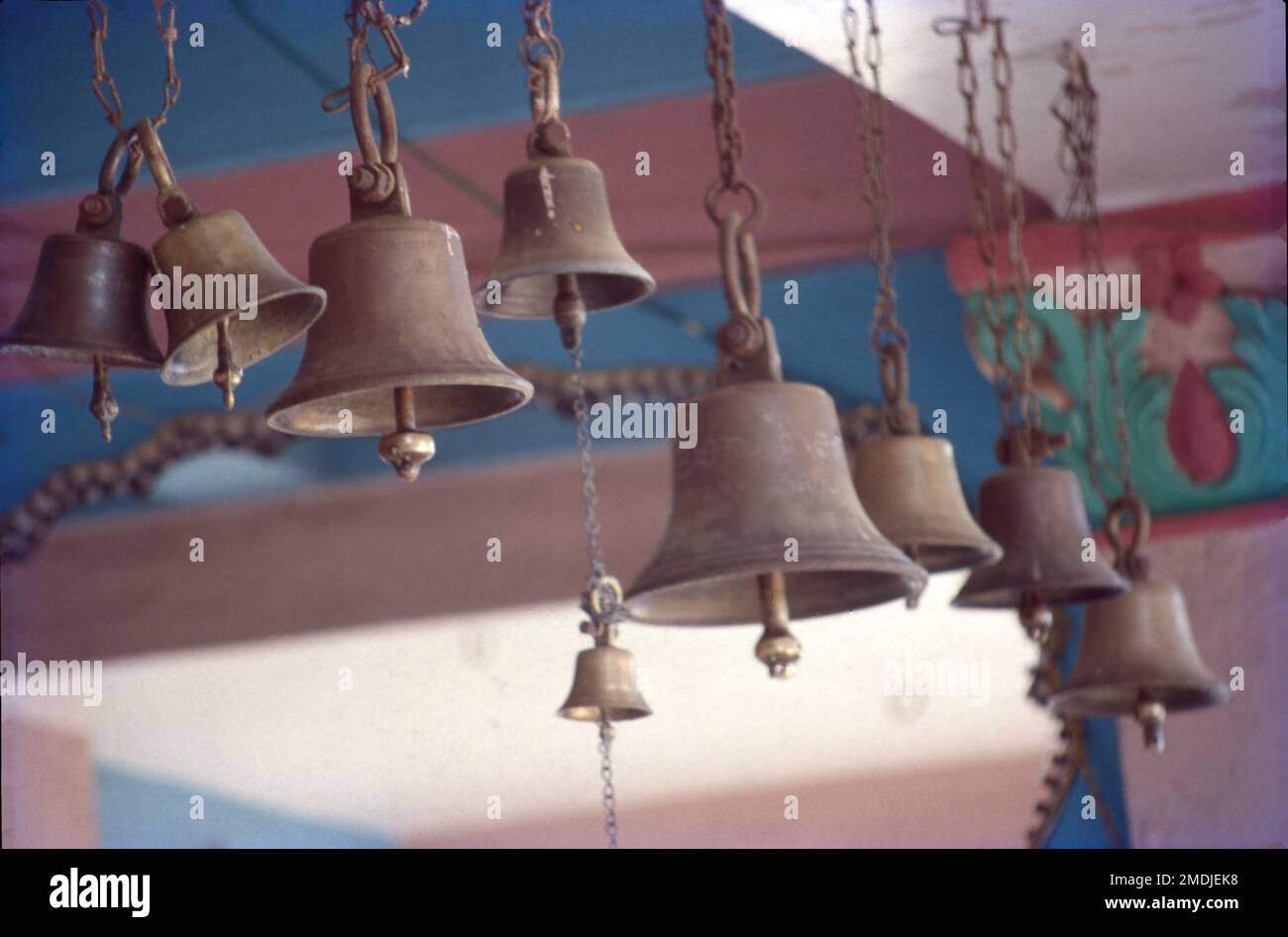 In Hinduism, bells are generally hung at the temple dome in front of ...