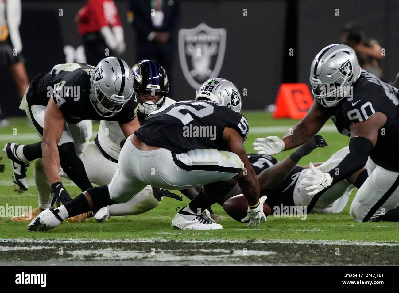 Las Vegas Raiders' Denzel Perryman (52) recovers a fumble by Baltimore ...