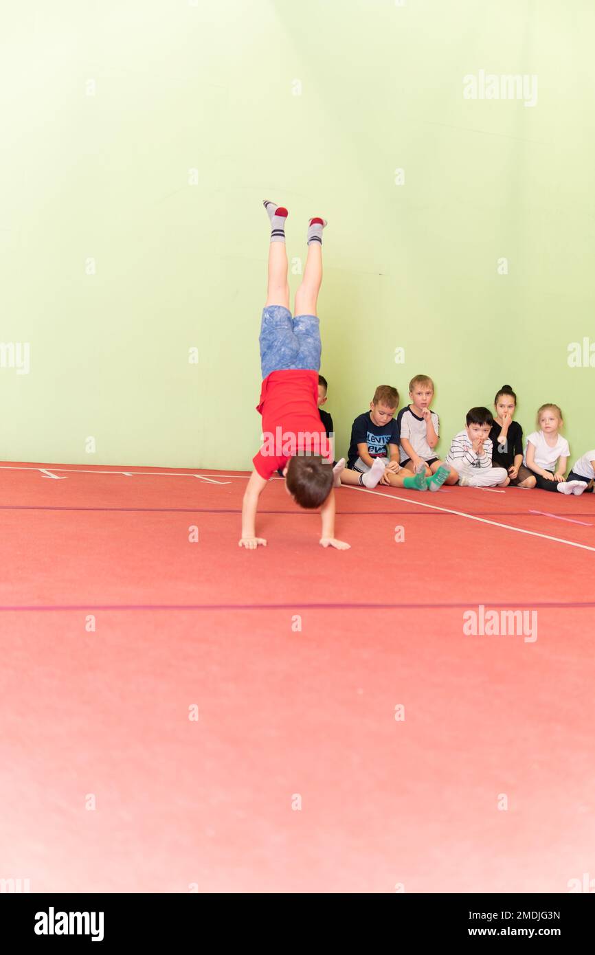MOSCOW, RUSSIA-DEC 18, 2022: childhood sport fitness exercise boy kid ...
